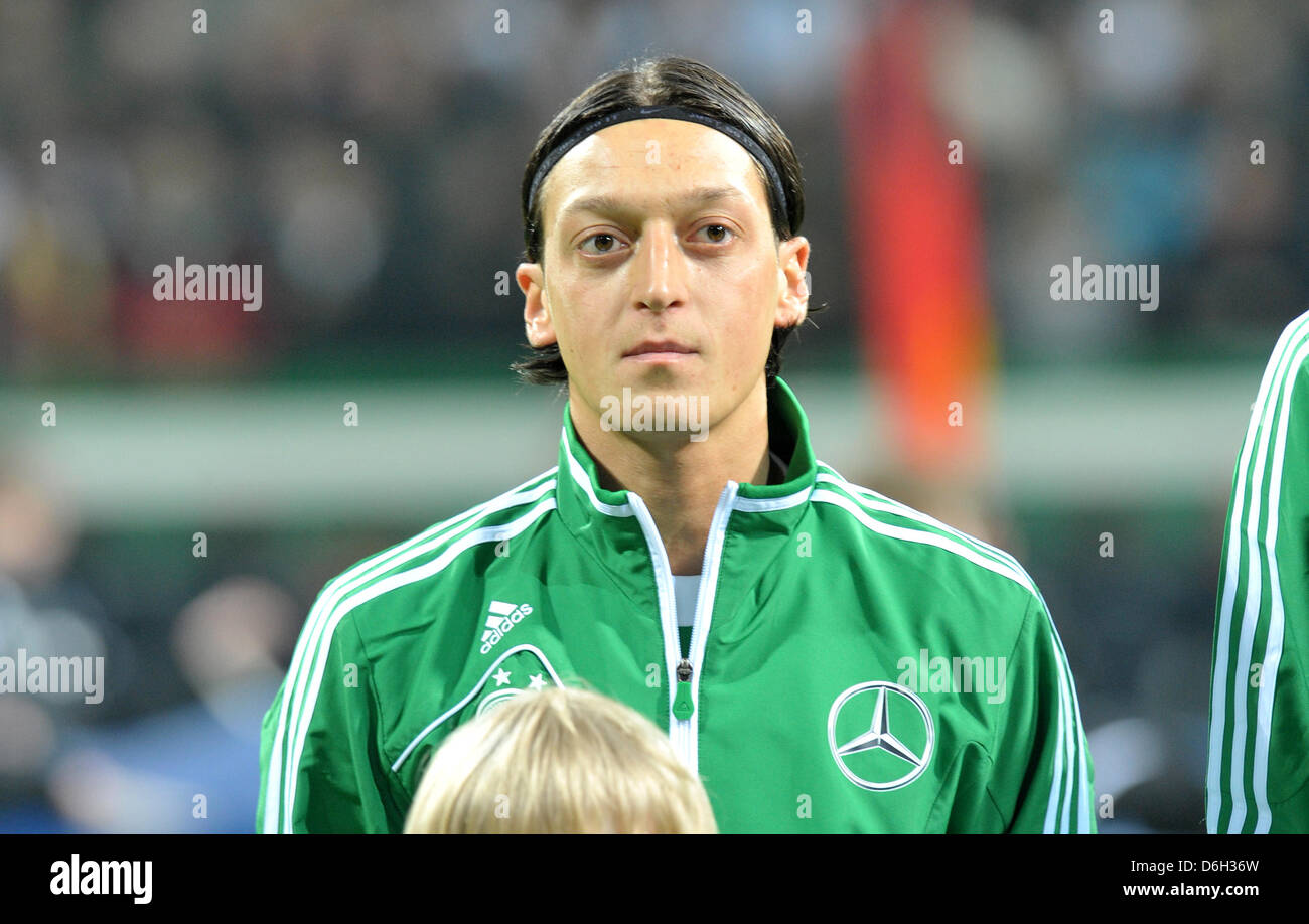 Germany's Mesut Ozil listens to the German national anthem before the ...