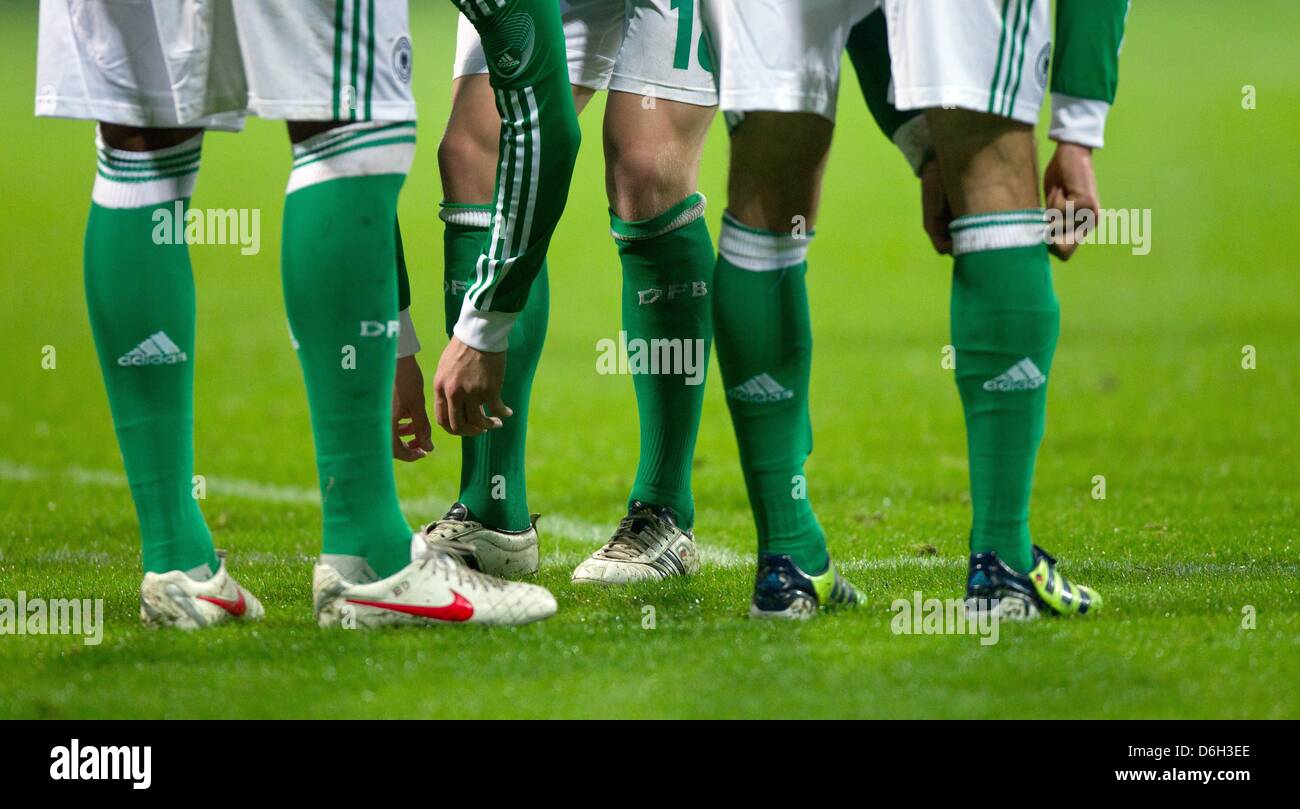 Legs of German players before the international friendly soccer match ...
