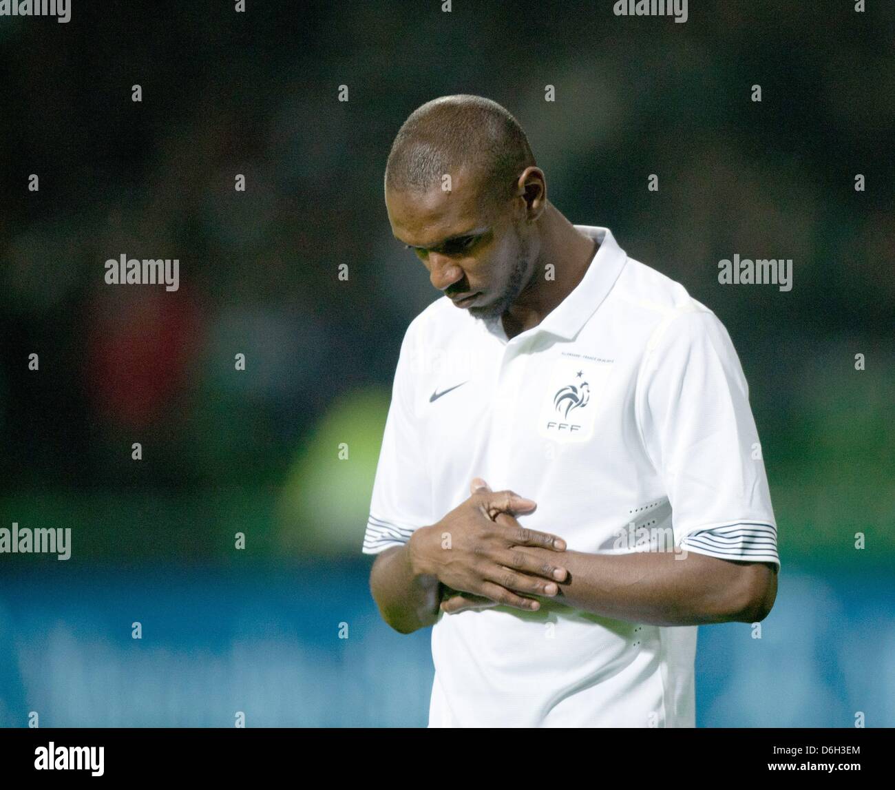 Eric Abidal of France prays before the international friendly soccer ...