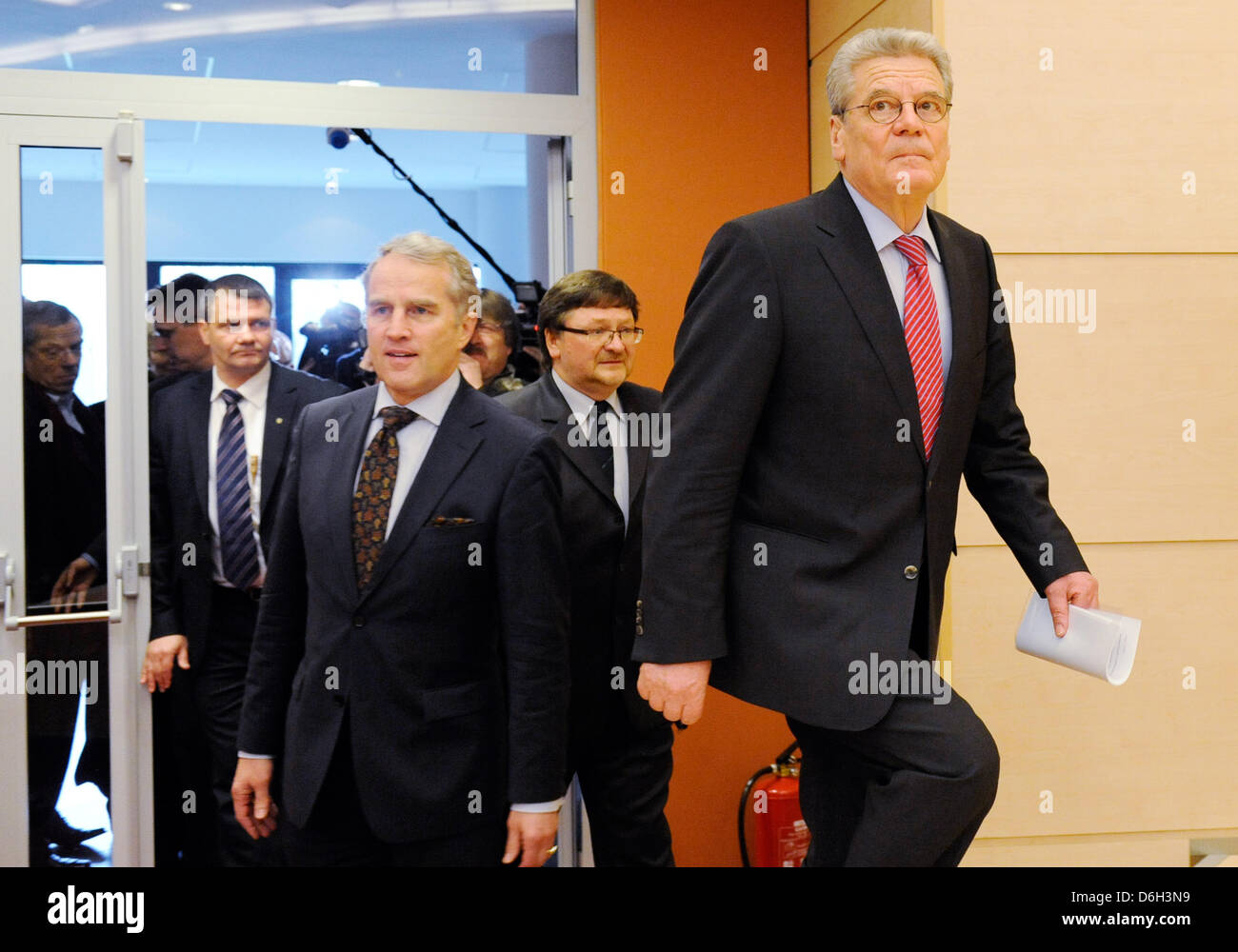 German President-elect Joachim Gauck (R) arrives to deliver a speech at ...