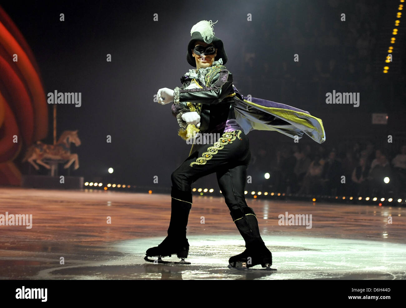 A figure skater dances on ice during the premiere of the Holiday on Ice ...