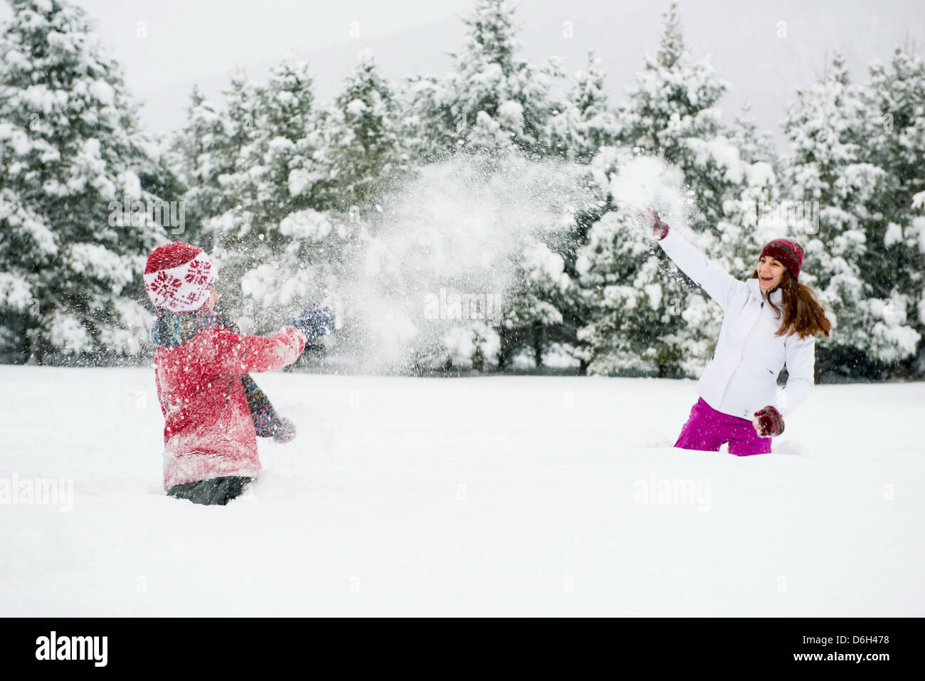 Children playing in snow Stock Photo - Alamy