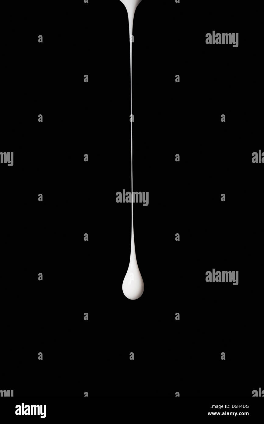 Drop of white paint Stock Photo - Alamy