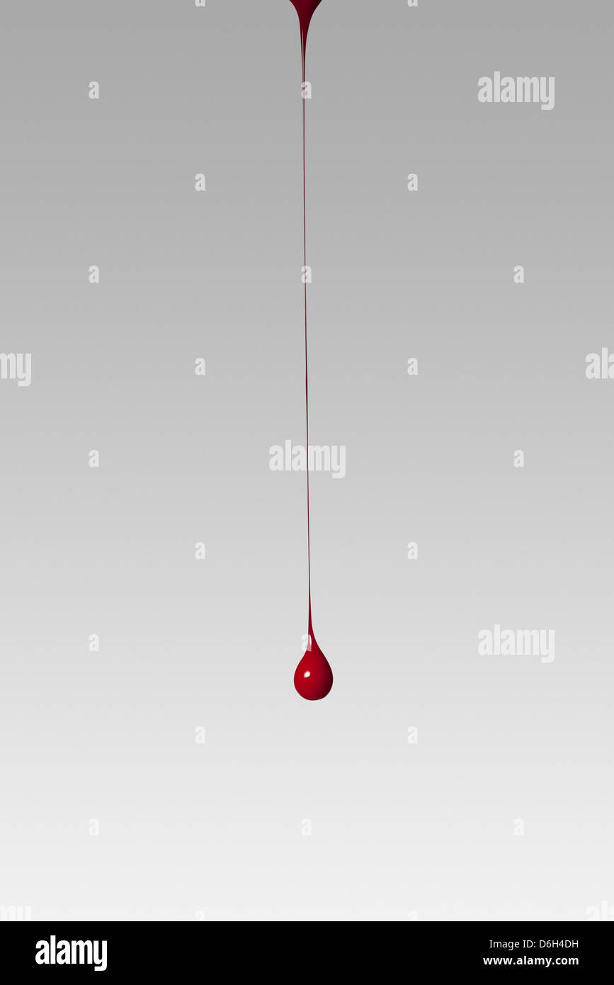 Drop of red paint Stock Photo - Alamy