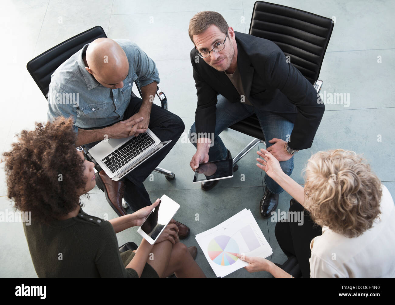 Business people talking in office Stock Photo - Alamy