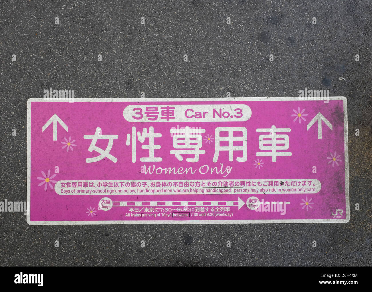 Women-only train car sign on the ground Stock Photo - Alamy