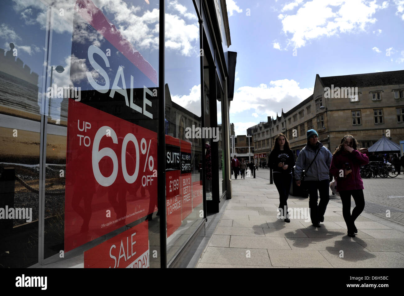 Cambridge, UK. 18th April 2013. Shoppers in Cambridge UK pass sale ...