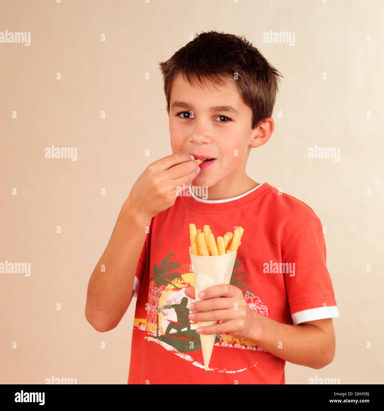 Child eating pastry sticks Stock Photo - Alamy