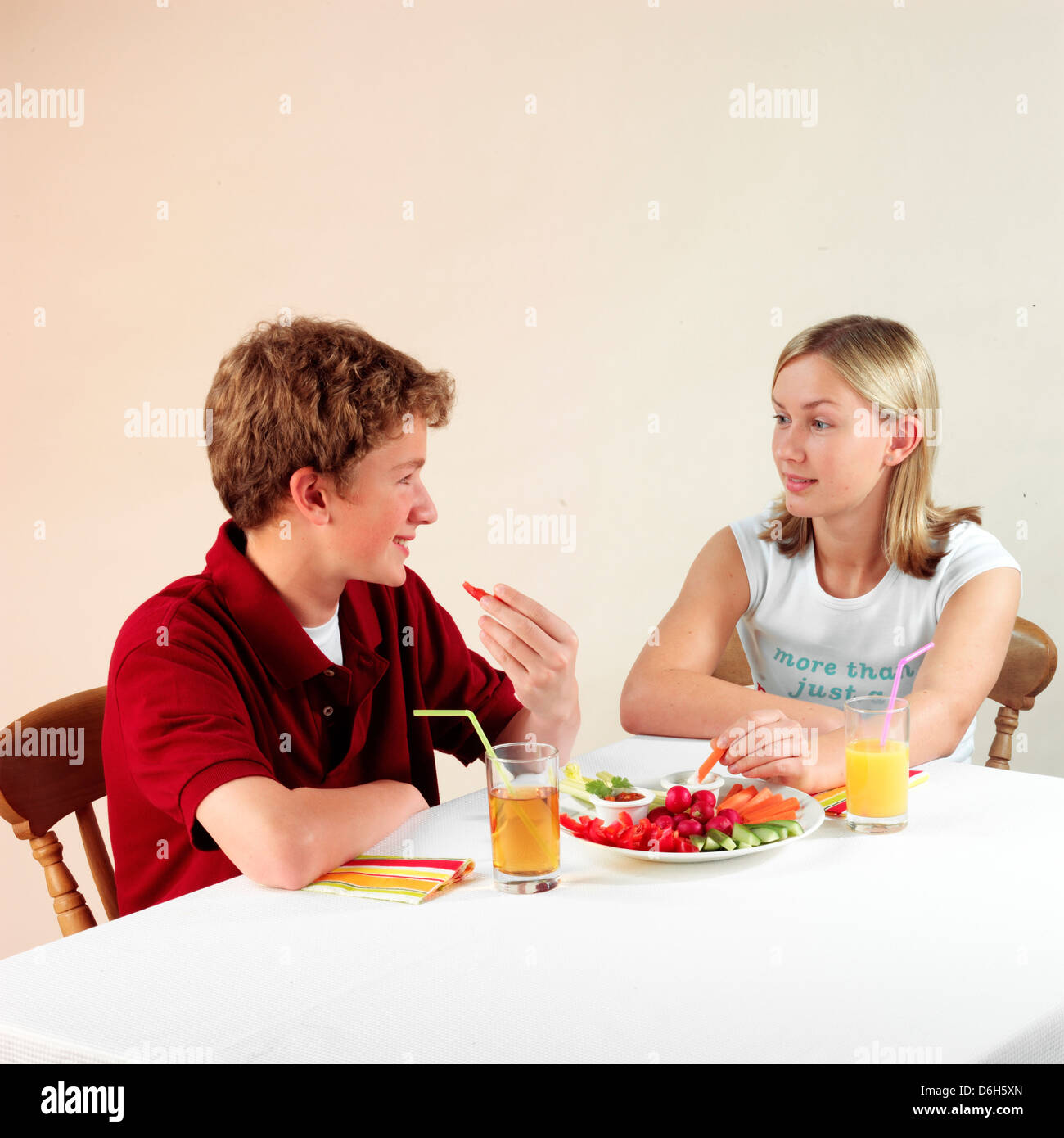 Children eating and drinking Stock Photo - Alamy