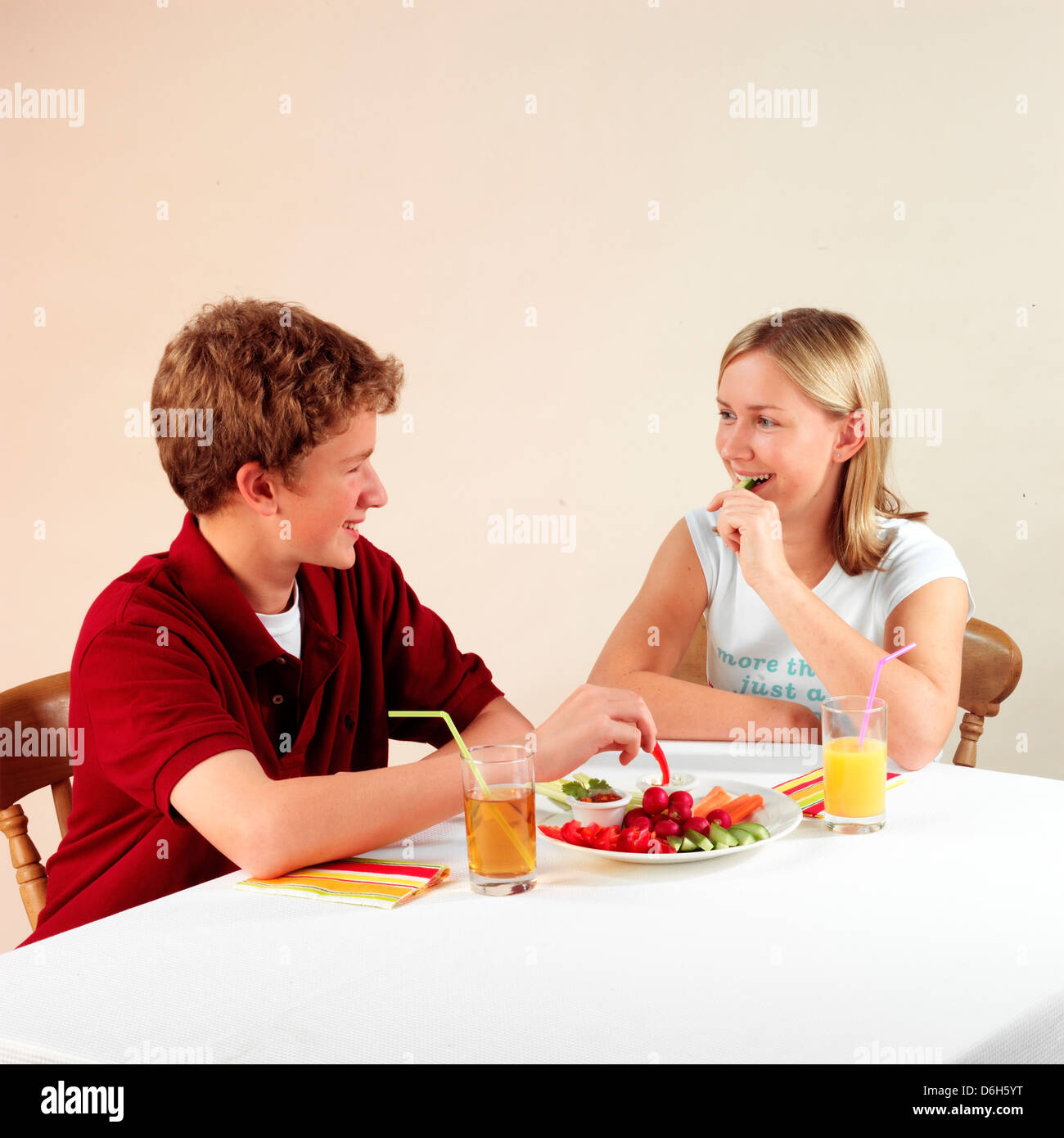 Children eating and drinking Stock Photo - Alamy