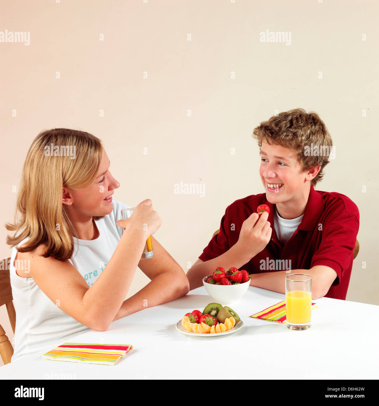 Children eating and drinking Stock Photo - Alamy