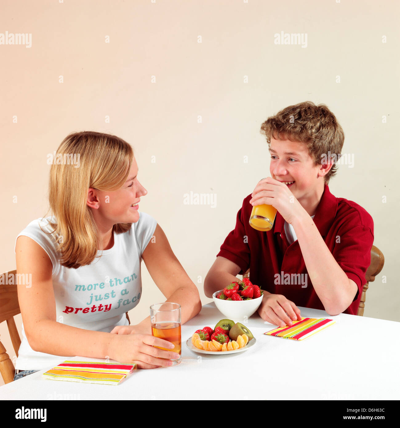 Children eating and drinking Stock Photo - Alamy
