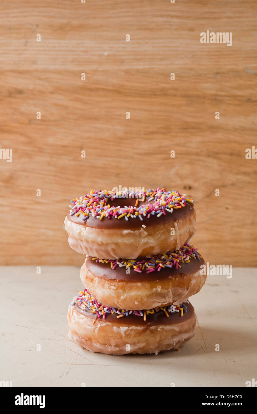 Stack of decorated doughnuts Stock Photo - Alamy