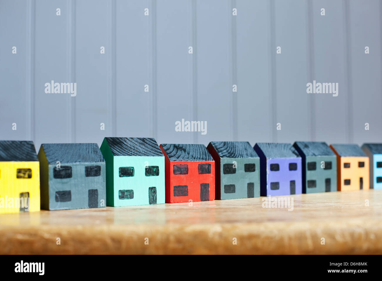 Colorful model houses on counter Stock Photo - Alamy