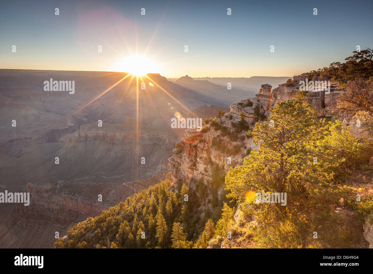 Sun rising over rural mountains Stock Photo - Alamy