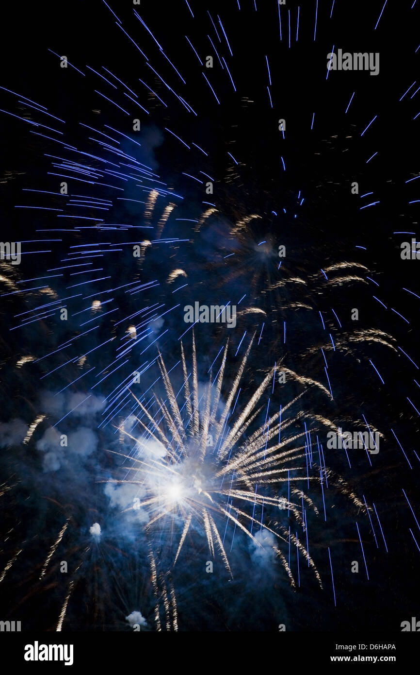 Fireworks exploding in night sky Stock Photo - Alamy
