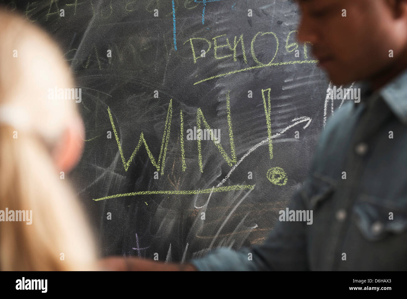 Blackboard with word win written on it Stock Photo - Alamy