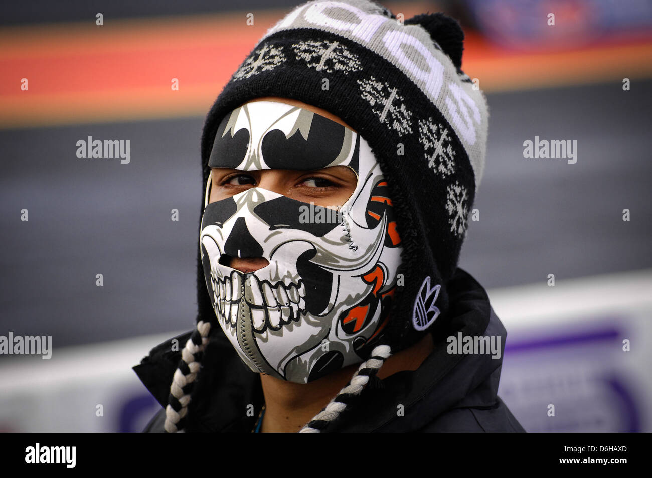 Anonymous person wearing a scary mask Stock Photo - Alamy