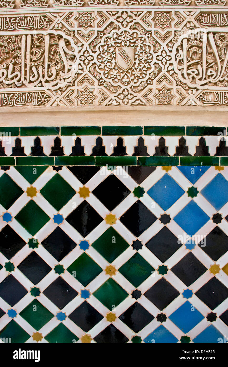 Intricate Islamic stucco artwork and repetitive tile pattern Alhambra Palace UNESCO world ...