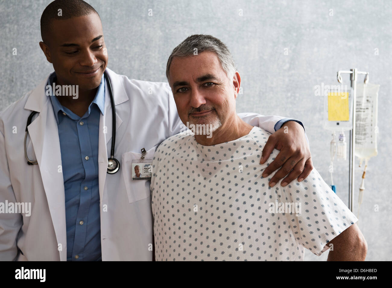 Doctor supporting patient Stock Photo - Alamy