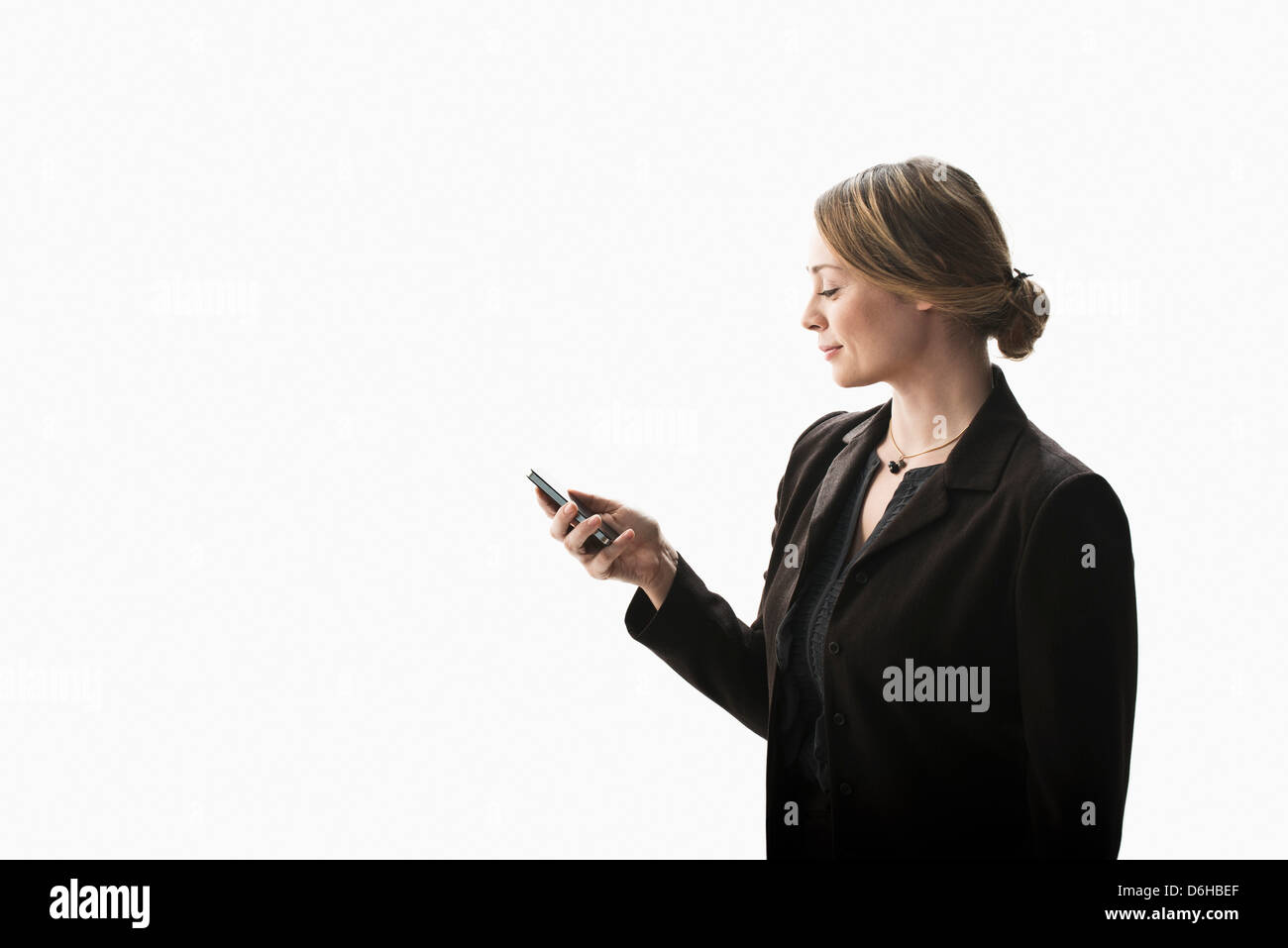 Business woman texting on smartphone Cut Out Stock Images & Pictures ...