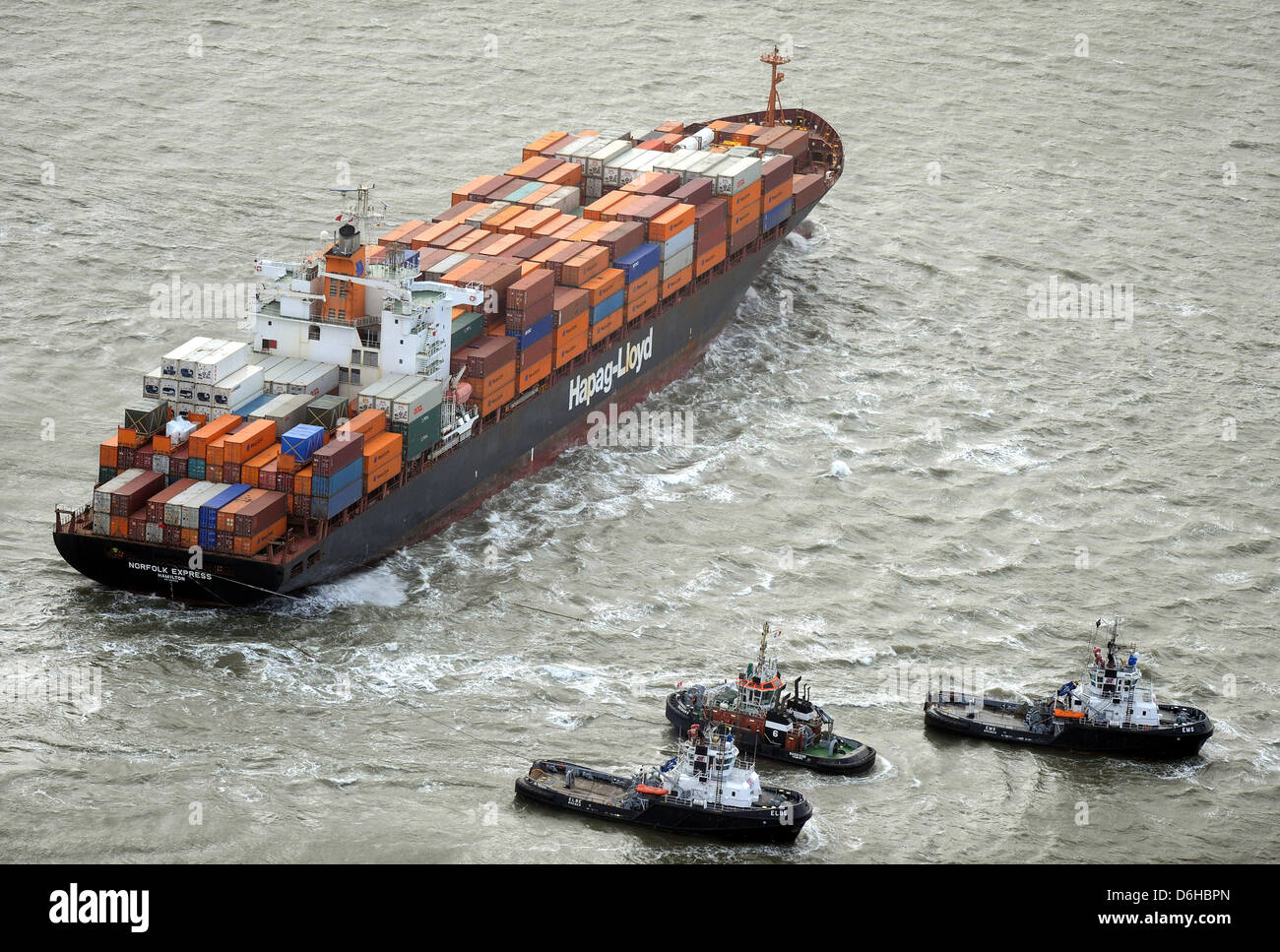 The container ship 'Norfolk Express' from shipping line Hapag Lloyd is ...