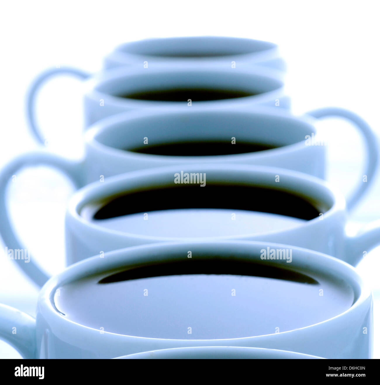 Cups of coffee in a line Stock Photo - Alamy