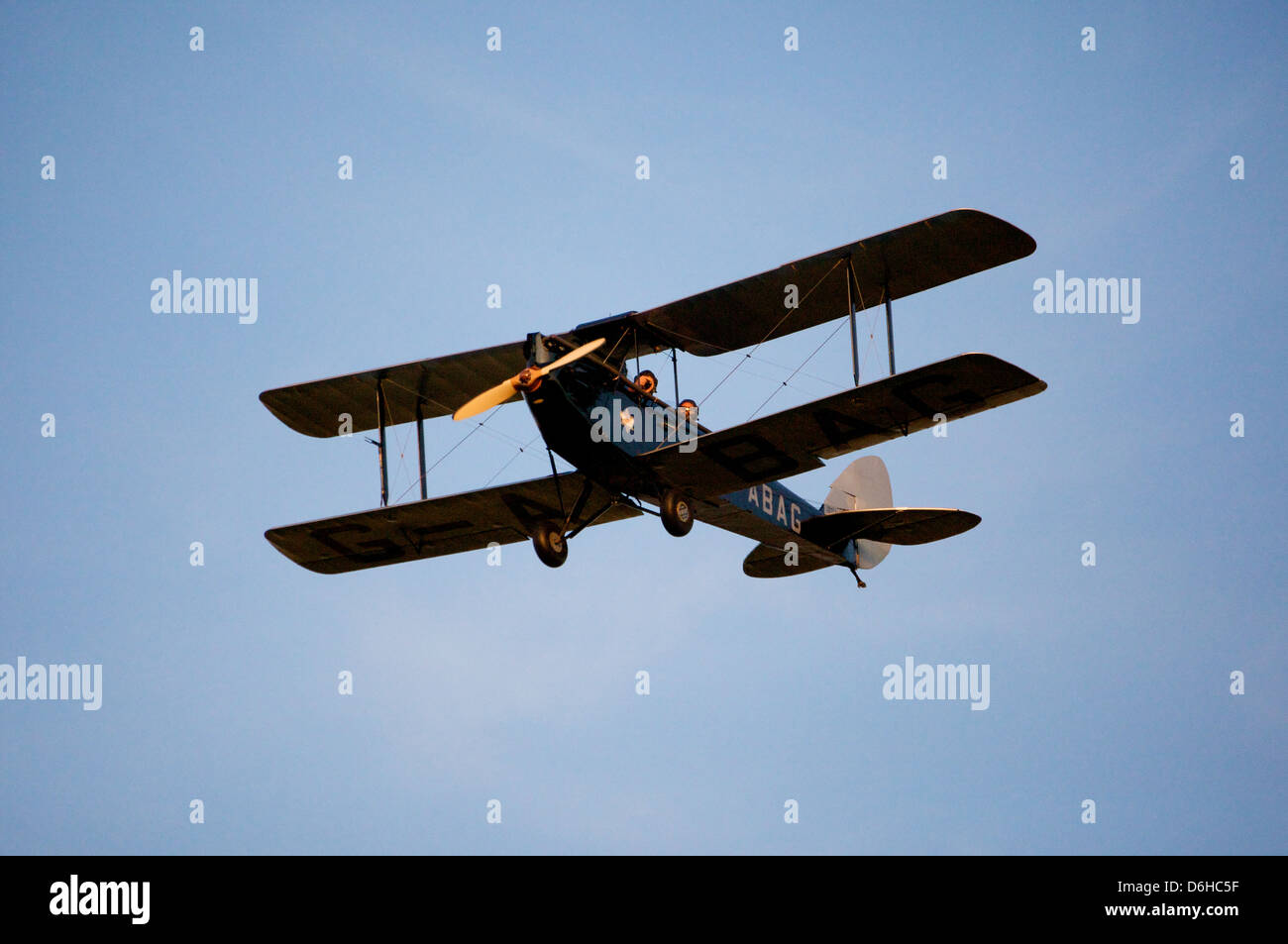 Biplane in flight Stock Photo - Alamy