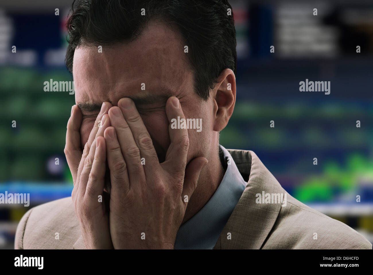 Businessman crying at stock exchange Stock Photo - Alamy