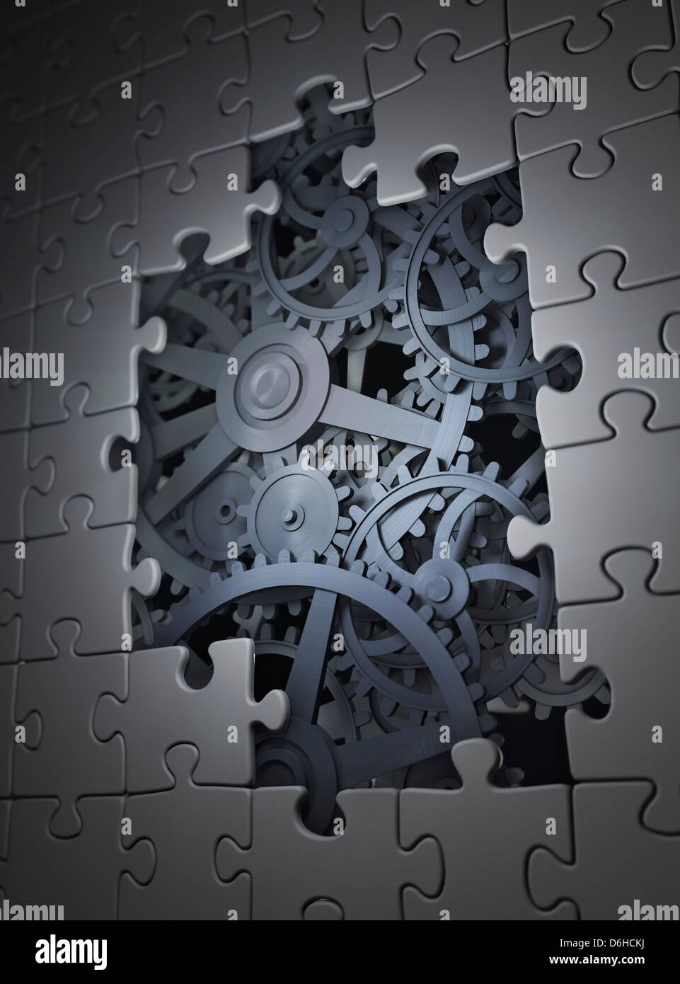 Mechanical puzzle, conceptual artwork Stock Photo - Alamy