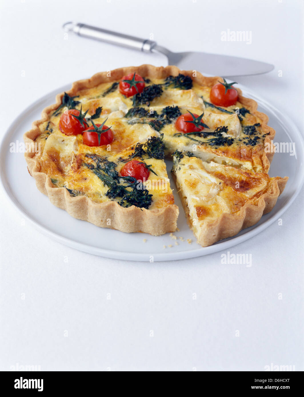 Quiche and slice Stock Photo - Alamy