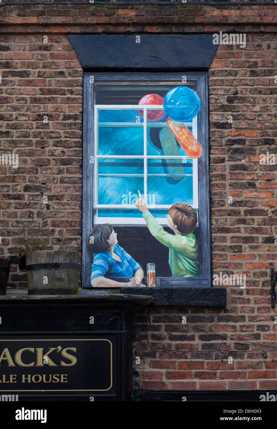 painting on a bricked up window Stock Photo - Alamy