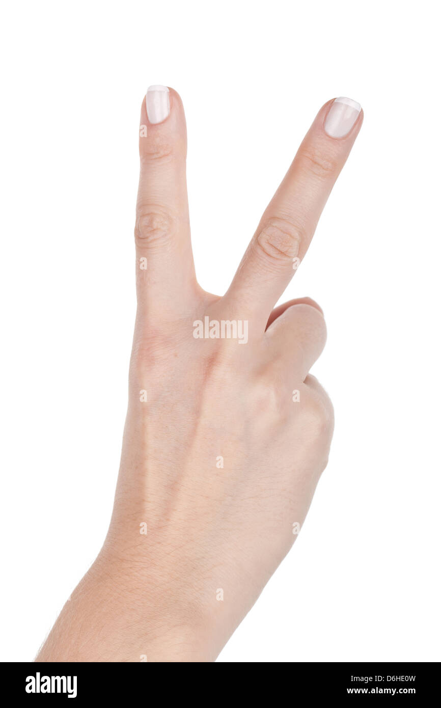 Woman hand shows two fingers, closeup on white background Stock Photo ...