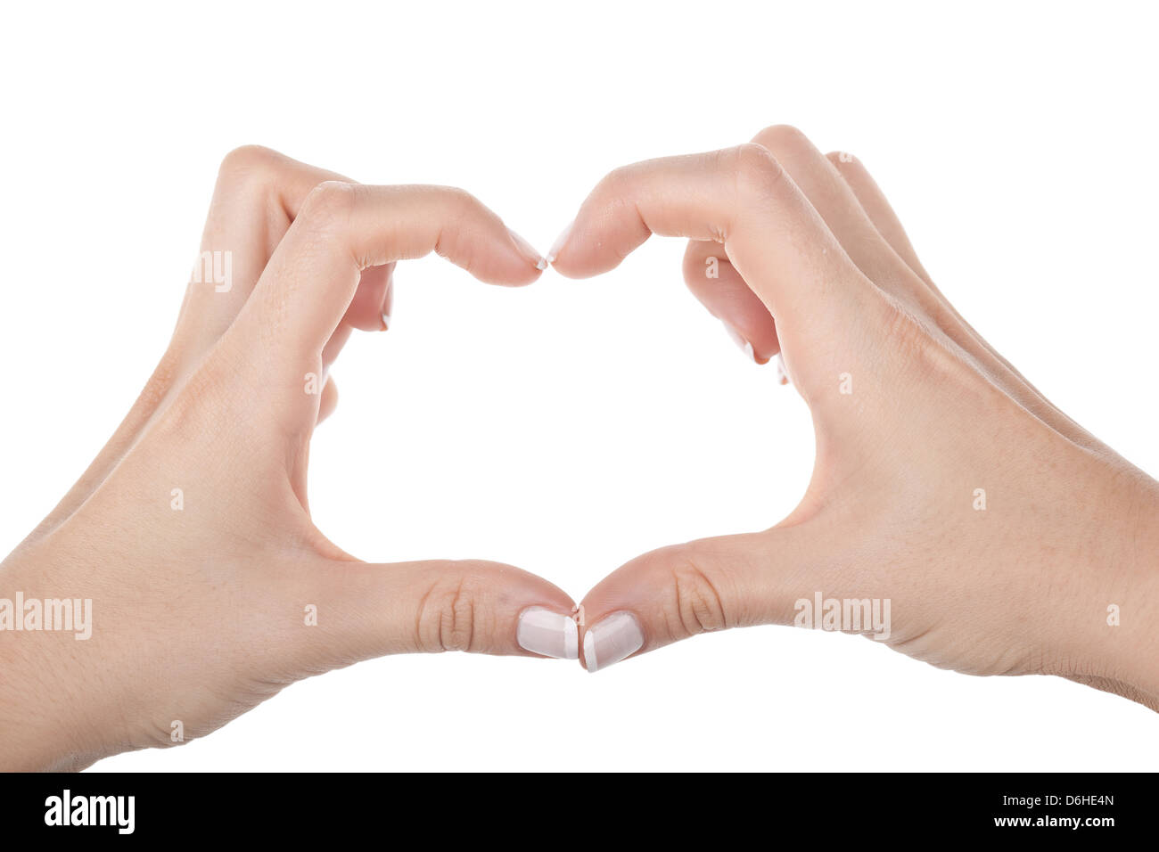 Woman hand shows heart, closeup on white background Stock Photo - Alamy