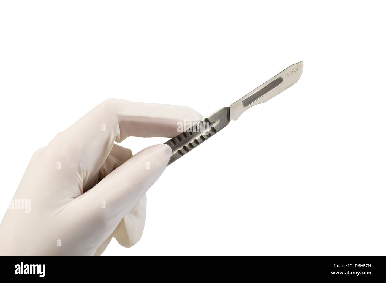 Hand holding scalpel Stock Photo - Alamy