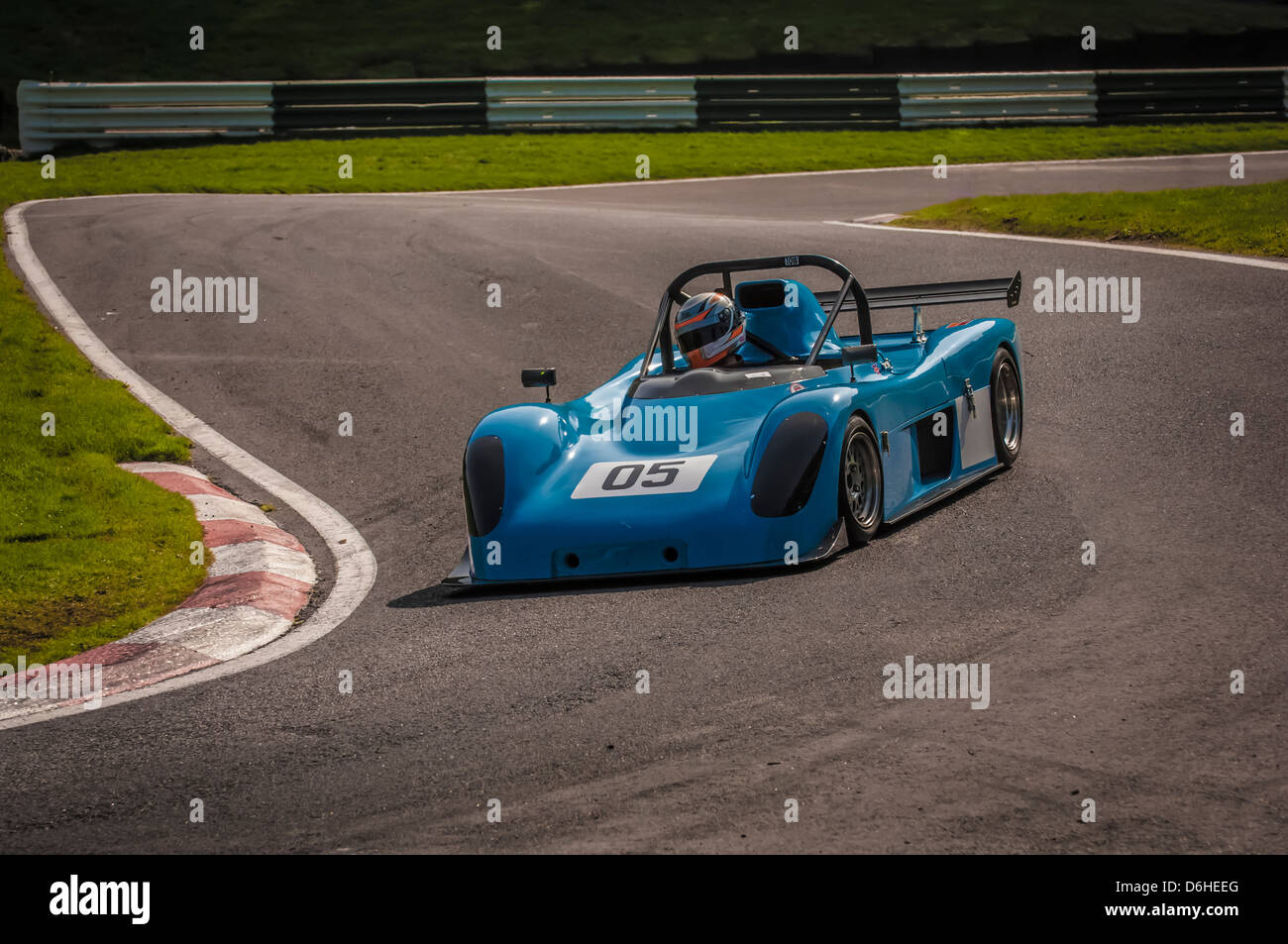 Blue Kit Car with 05 on the bonnet racing on Cadwell park race track ...