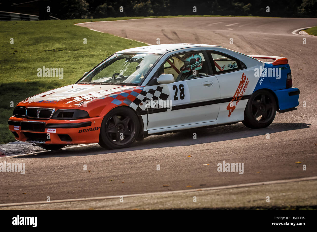 Side view of an old Rover car racing at Cadwell park race track Stock ...