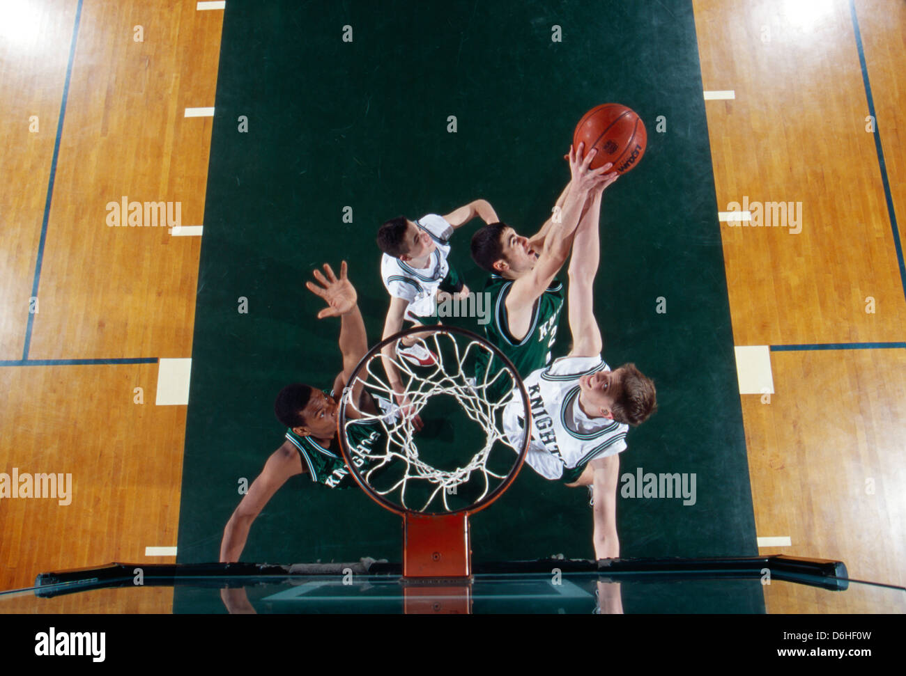 View from over net of high school basketball scrimmage Stock Photo - Alamy