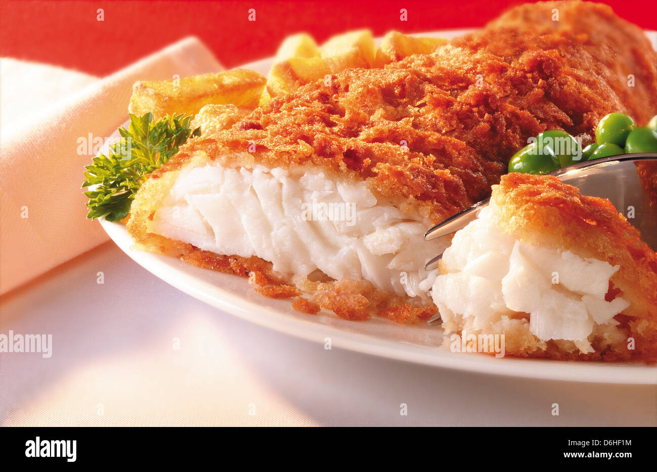 Battered cod, chips, and peas Stock Photo - Alamy