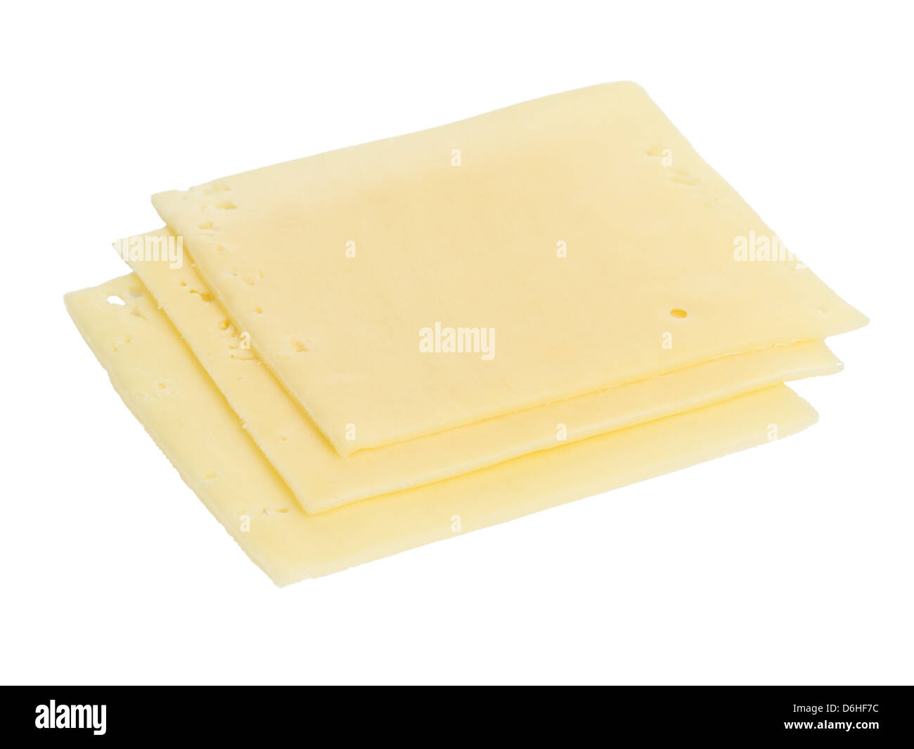 three square slices of edam cheese, isolated on white Stock Photo - Alamy