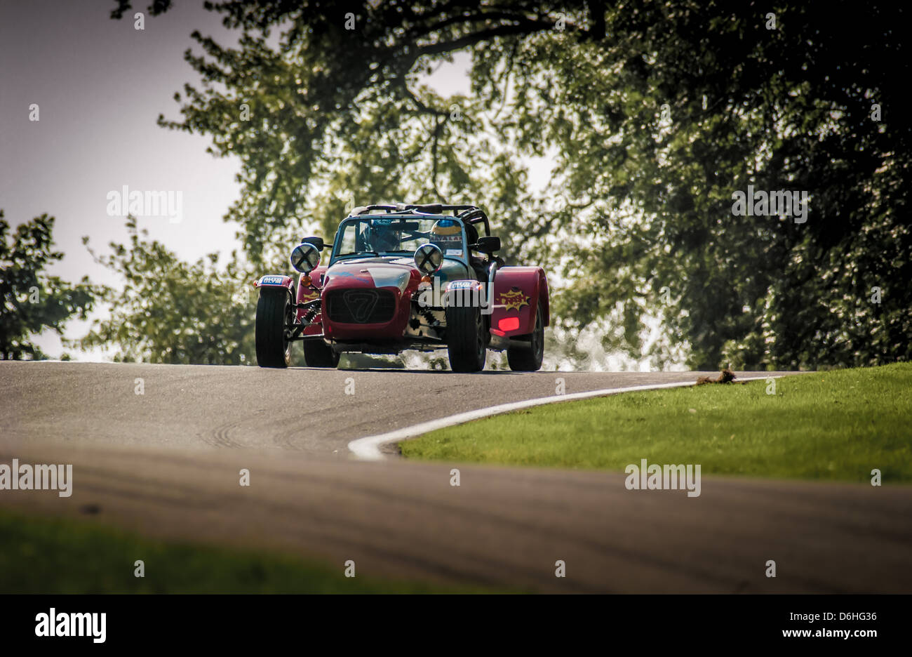 Caterham Seven sports car racing towards a bend in the track at Cadwell ...