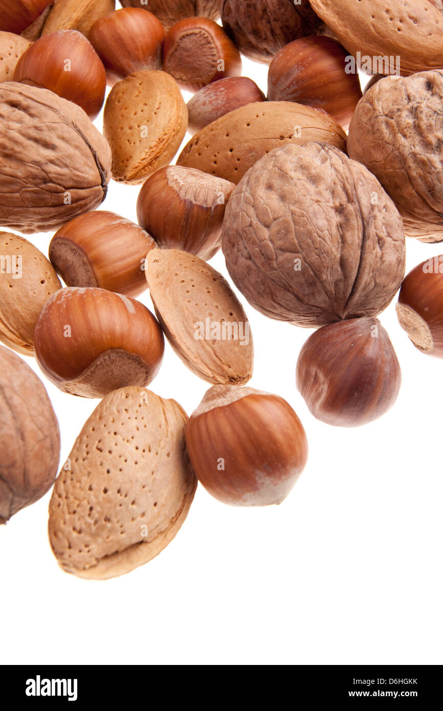 Nuts on white background Stock Photo - Alamy