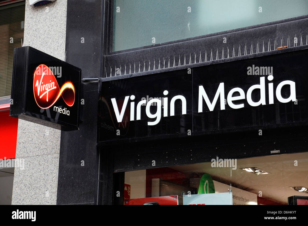 Sign outside virgin media shop in uk high street hi-res stock ...