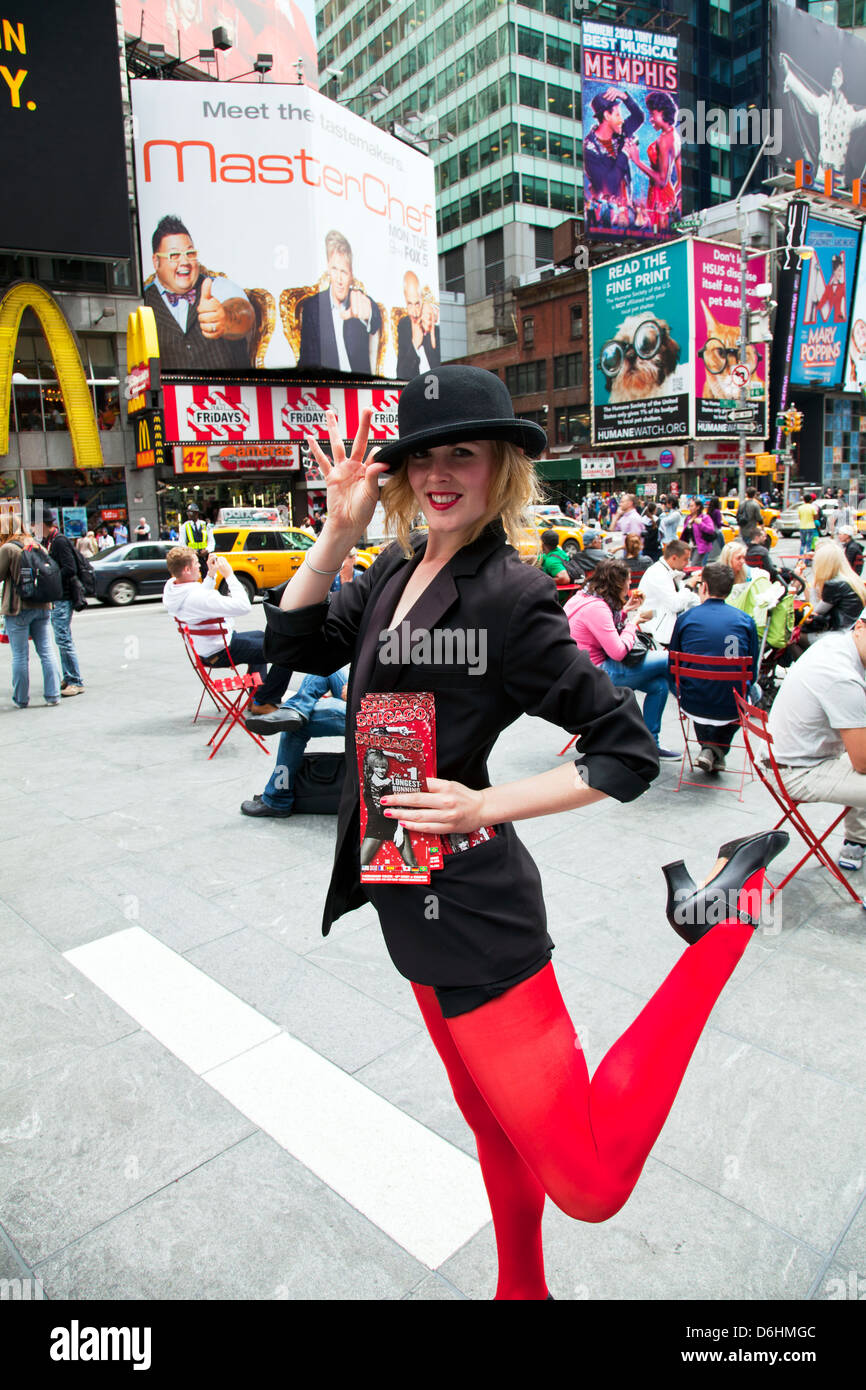 Dancing girl selling tickets for Chicago show in Times Square New York ...