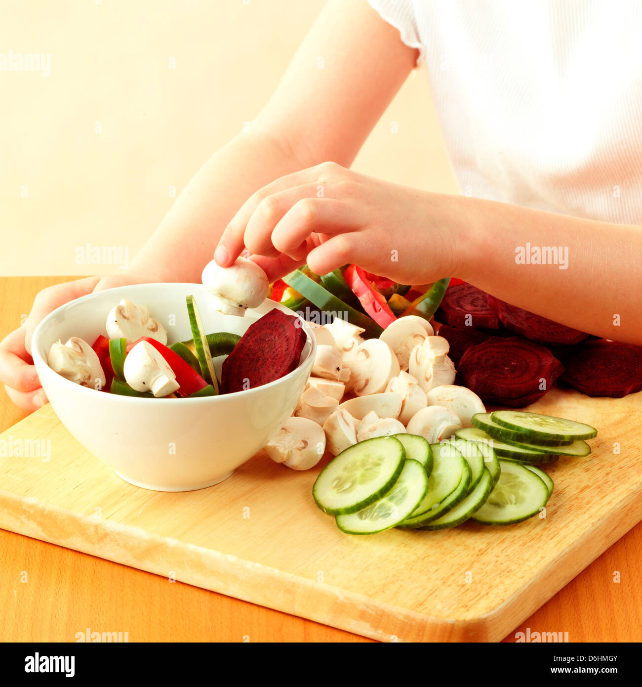 Child preparing salad and vegetables Stock Photo - Alamy