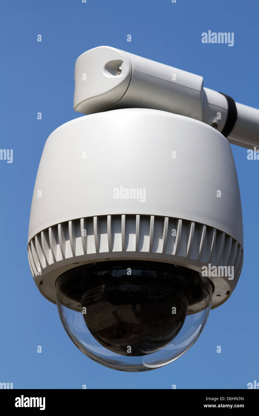 Outdoor security camera located against a blue sky background Stock ...