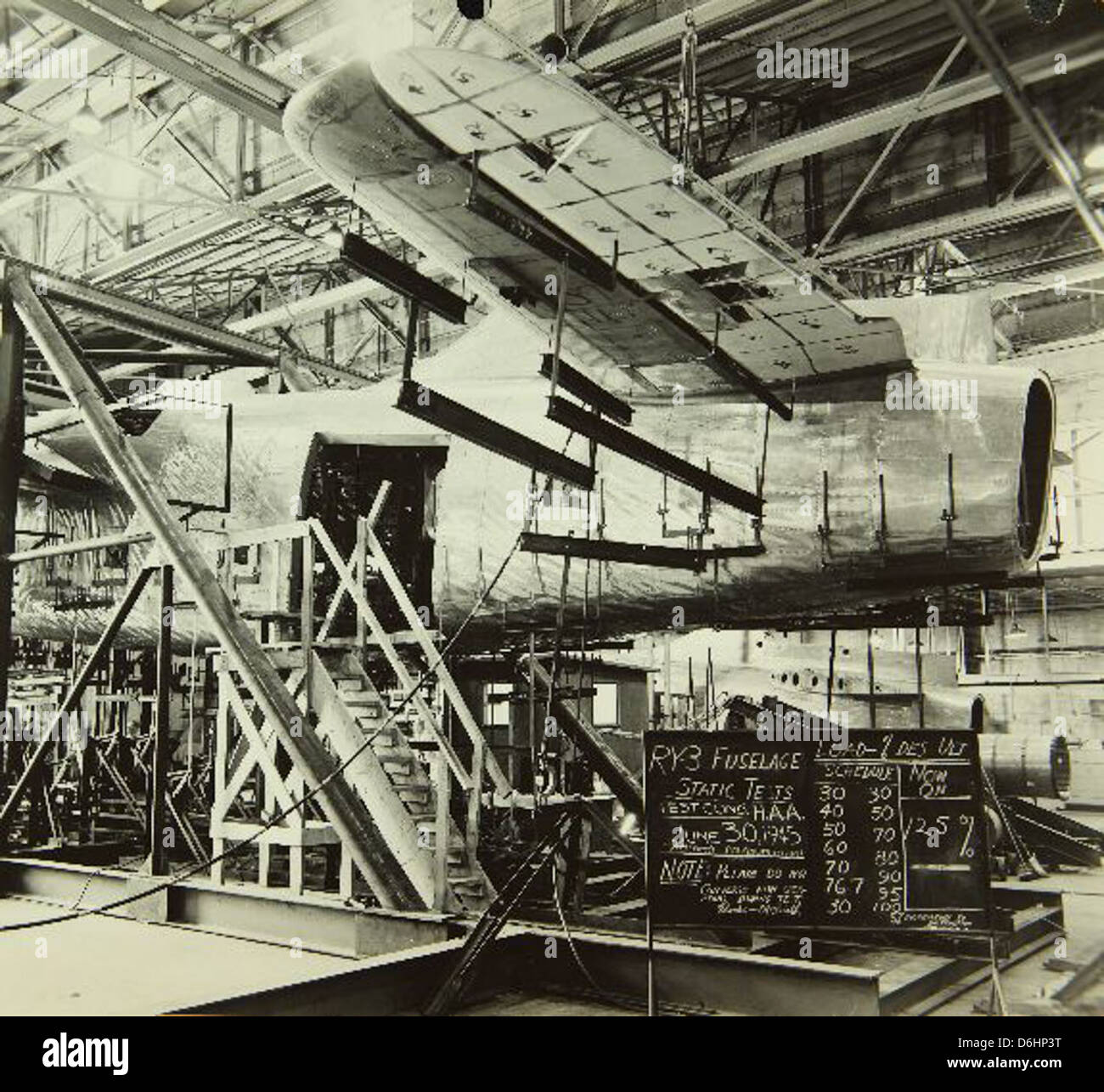 This image showcases personnel working at Convair/General Dynamics ...
