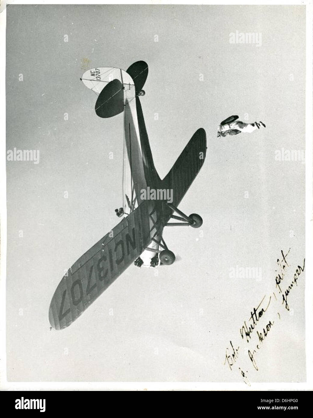 Bob Hutton is photographed in his parachute, showcasing his ...