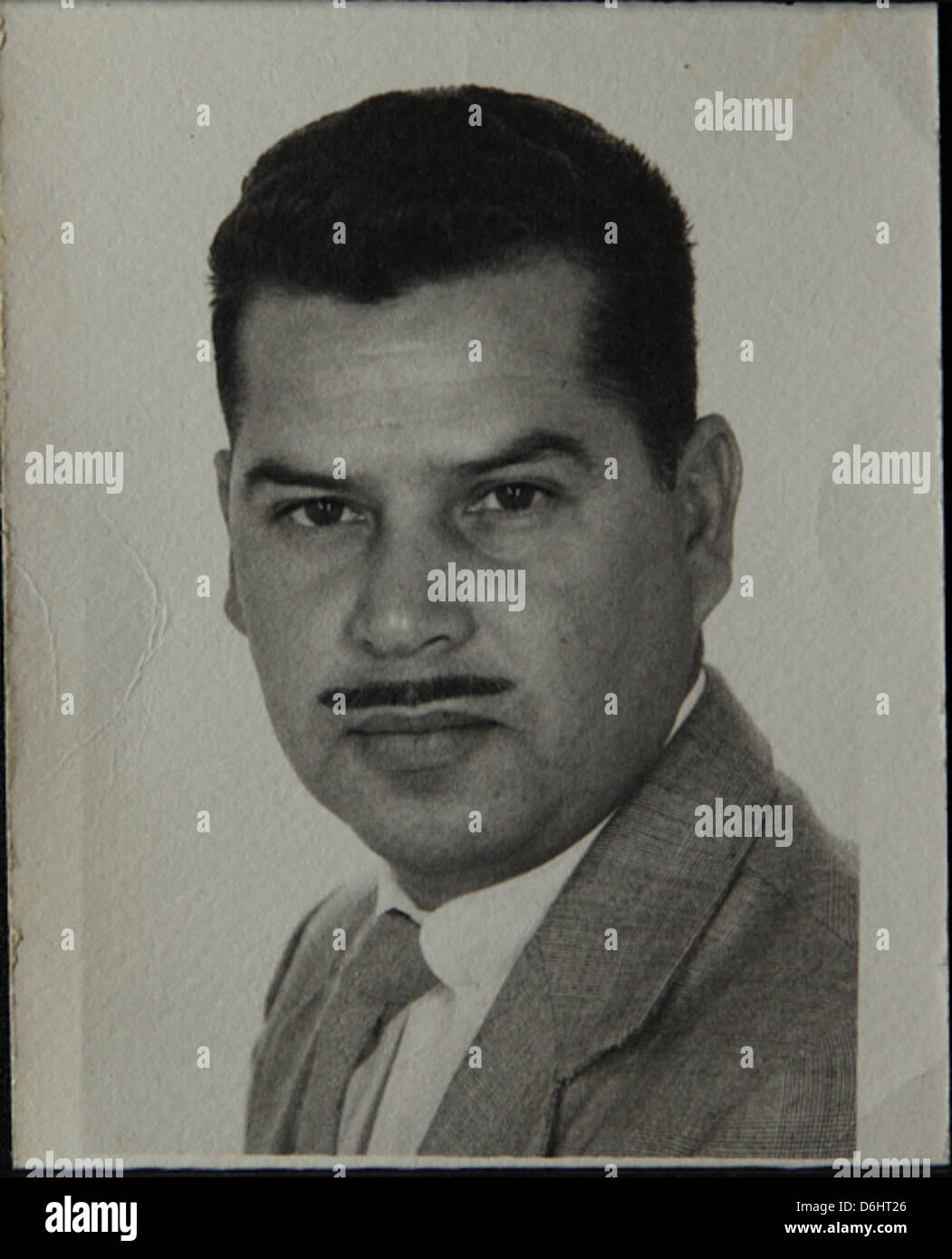 This photo features a man with a distinctive mustache, capturing a ...