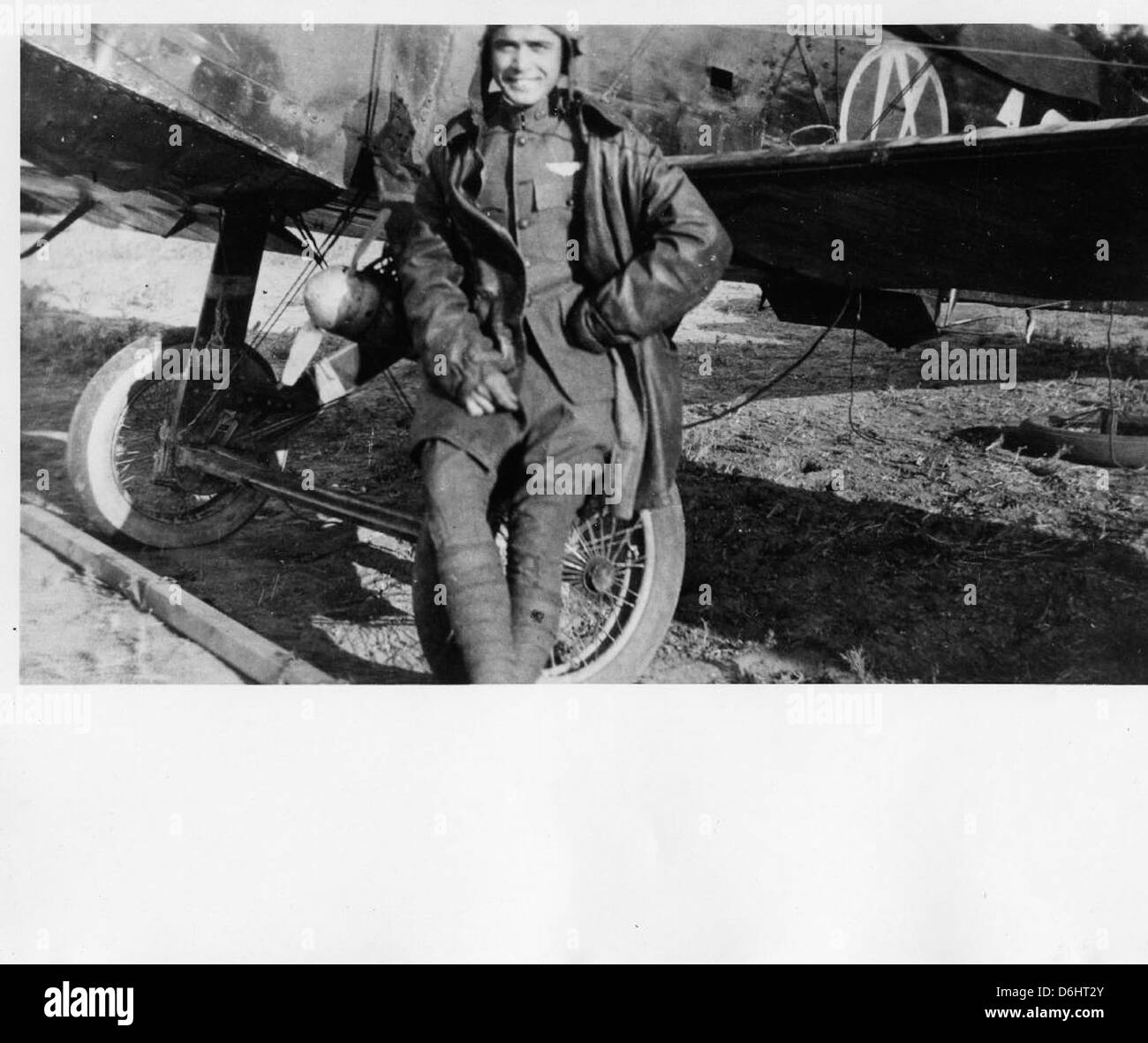 This photo features T. Claude Ryan with the Liberty D-H aircraft, a ...